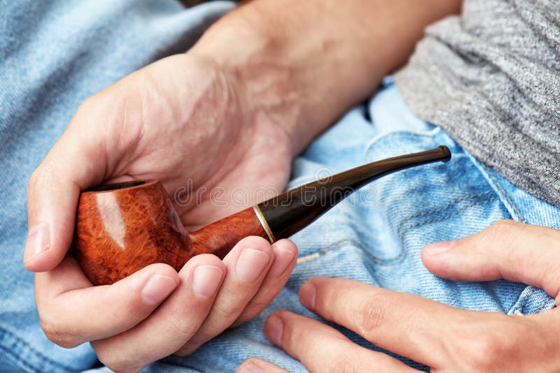 Man Holding Smoking Pipe in Hand. Closeup View Stock Image - Image of ...