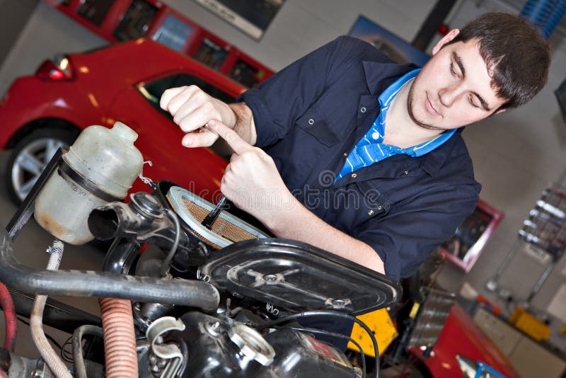 Man Holding a Spanner Over a Car Engine Stock Image - Image of motor ...