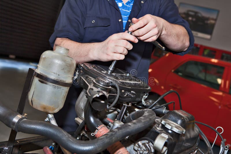 Man Holding a Spanner Over a Car Engine Stock Image - Image of people ...