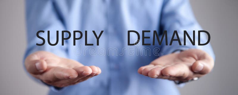 Man Holding Supply and Demand Word. Business Concept Stock Image ...