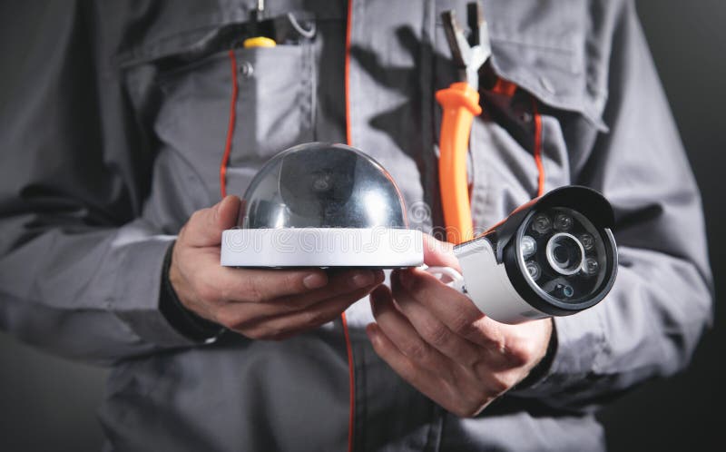 Man Holding Surveillance Security Camera Stock Image - Image of video ...