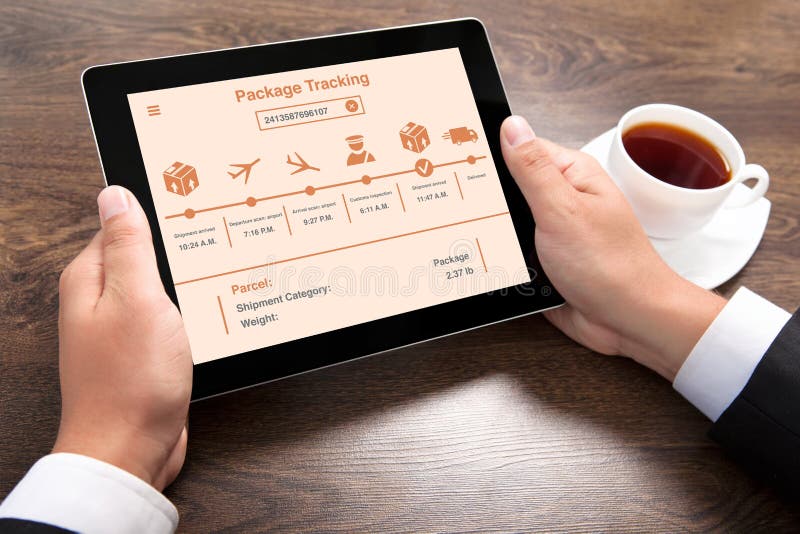 Man Holding Tablet with App Package Tracking on Screen Stock Photo ...