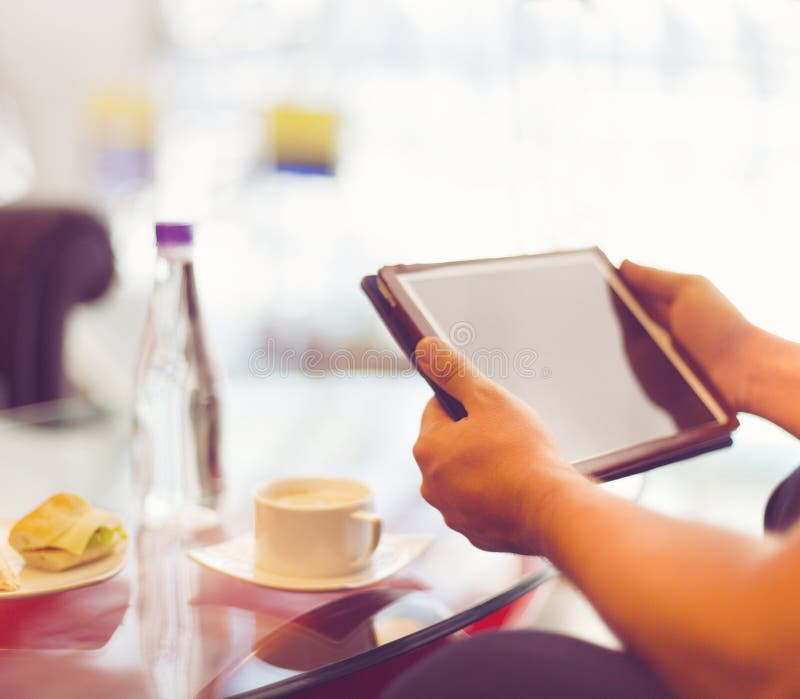 Man Holding Tablet Computer in Cafe Stock Image - Image of modern ...