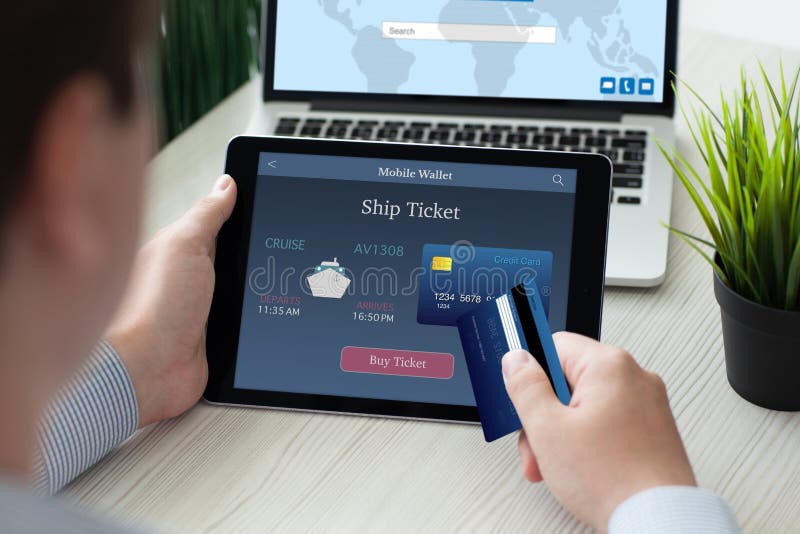 Man Holding Tablet Computer Online Ship Ticket and Credit Card Stock ...