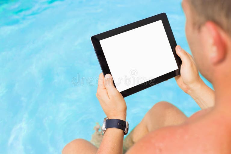 Man Holding Tablet Computer by the Swimming Pool Stock Image - Image of ...