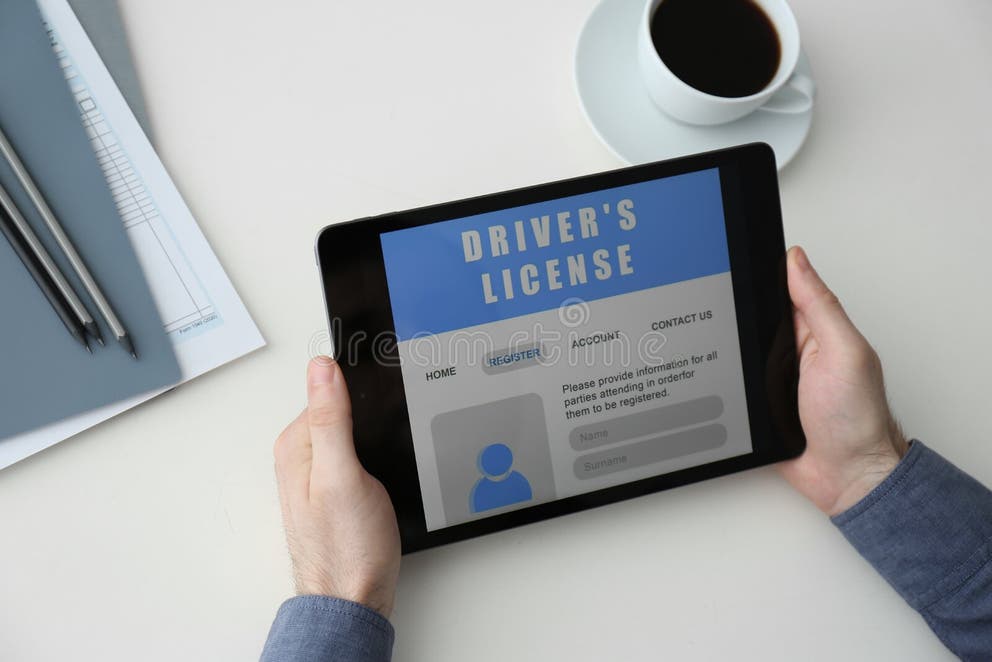 Man Holding Tablet with Driver`s License Application Form at White ...