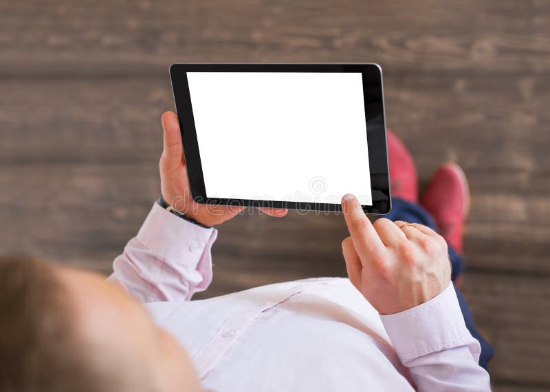 Man holding tablet. stock image. Image of home, news - 125910141