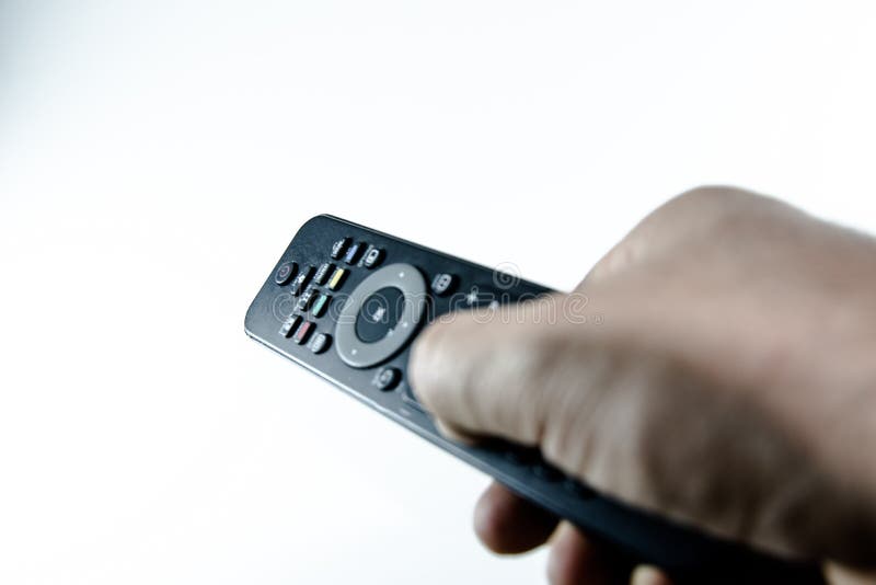 Man Holding Television Remote Control Stock Image - Image of black ...