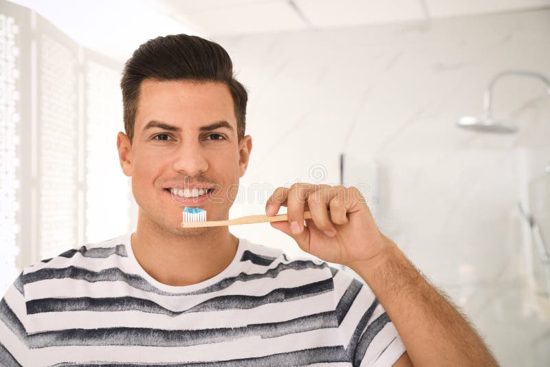 Man Holding Toothbrush with Paste at Home Stock Photo - Image of dental ...