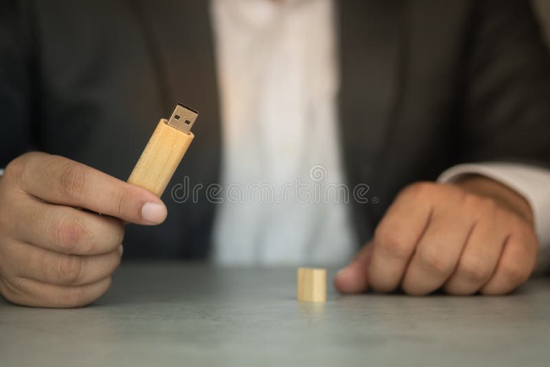 Man Holding USB Cable. Show the Symbol of Technology and Data Stock ...