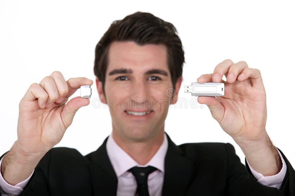 Man holding USB stick stock image. Image of icon, electronics - 32237085