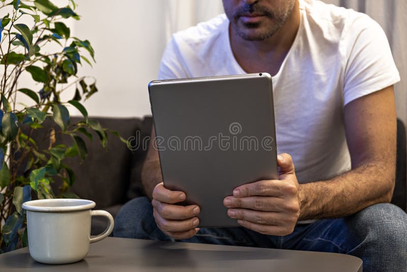 Man Holding Using Digital Tablet at Home. Online Education, Working ...
