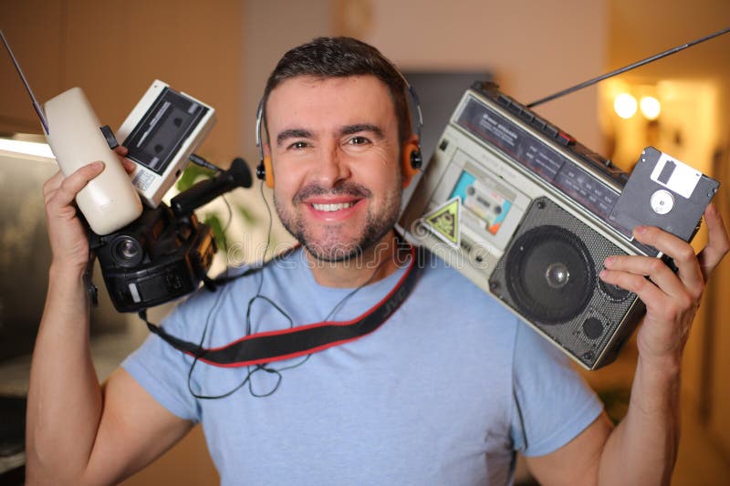 Man Holding Vintage Technology Items Stock Photos - Free & Royalty-Free ...