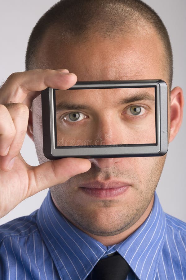 Man Holding Visual Display Device Stock Image - Image of device, face ...