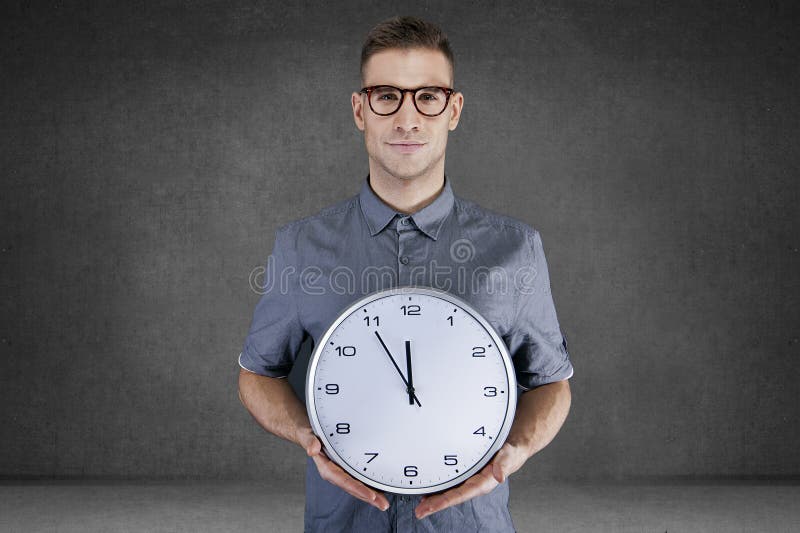 Male Office Worker with a Wall Clock Stock Photo - Image of businessman ...
