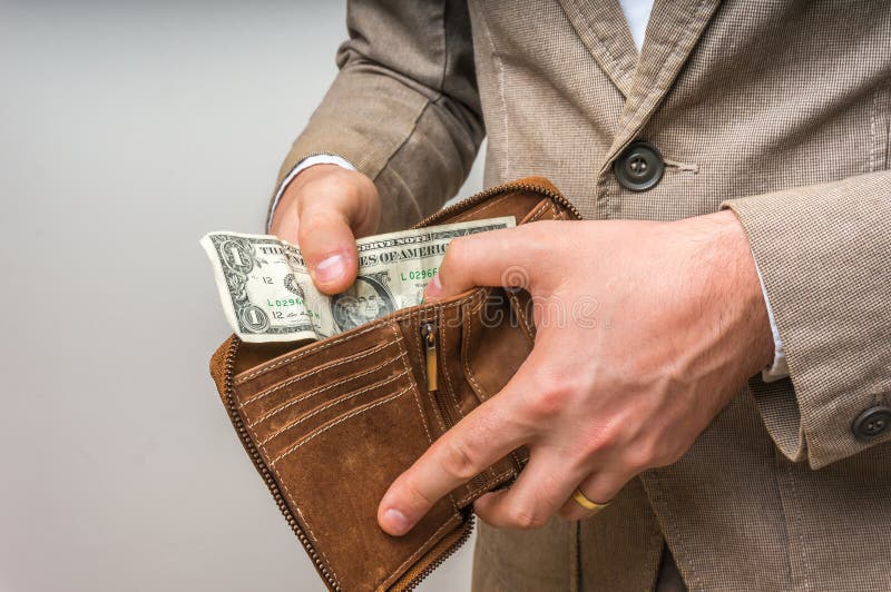 Man Holding Wallet with only One Dollar Inside Stock Image - Image of ...