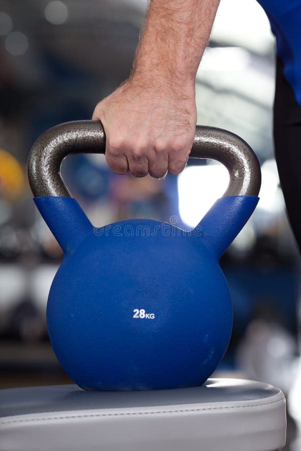 Man holding a weight stock photo. Image of athlete, muscular - 30682946