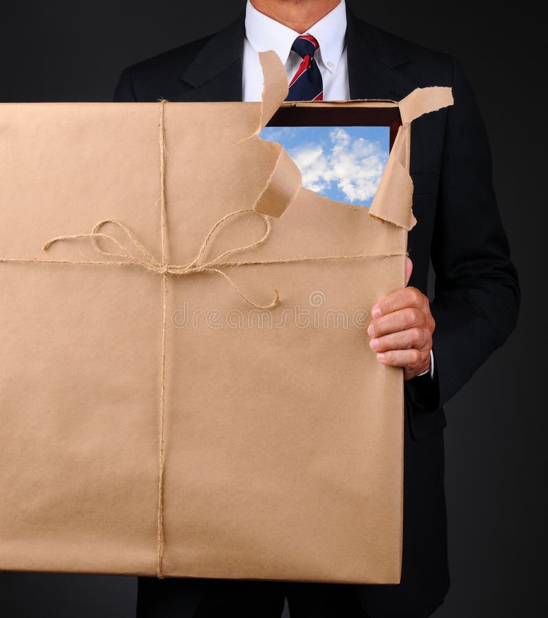 Man Holding Wrapped Frame with Torn Corner Stock Image - Image of male ...