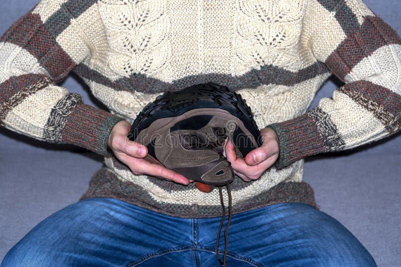 The Man Holds Shoes in Hands. Stock Image - Image of close, hand: 293146793