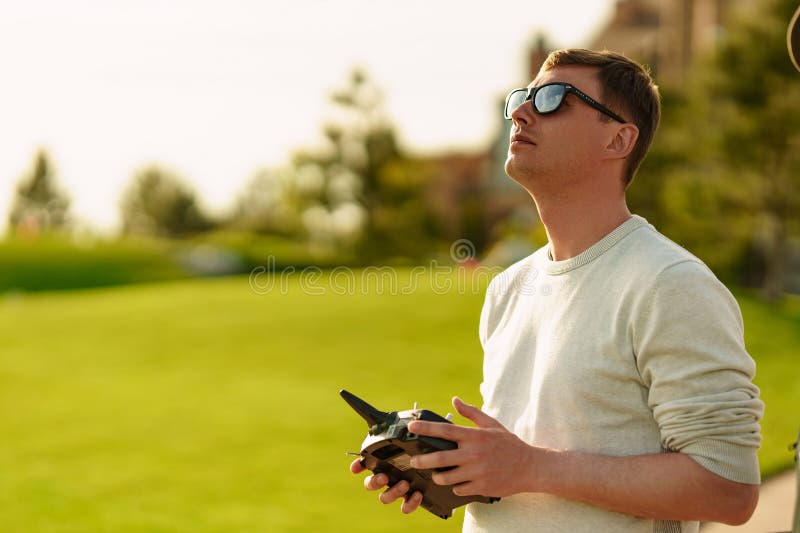 The Man Holds the Control Panel of the Plane in His Hands. Stock Image ...