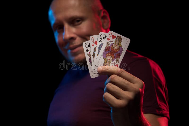 A Man Holds a Deck of Play Cards Stock Photo - Image of chip, beard ...