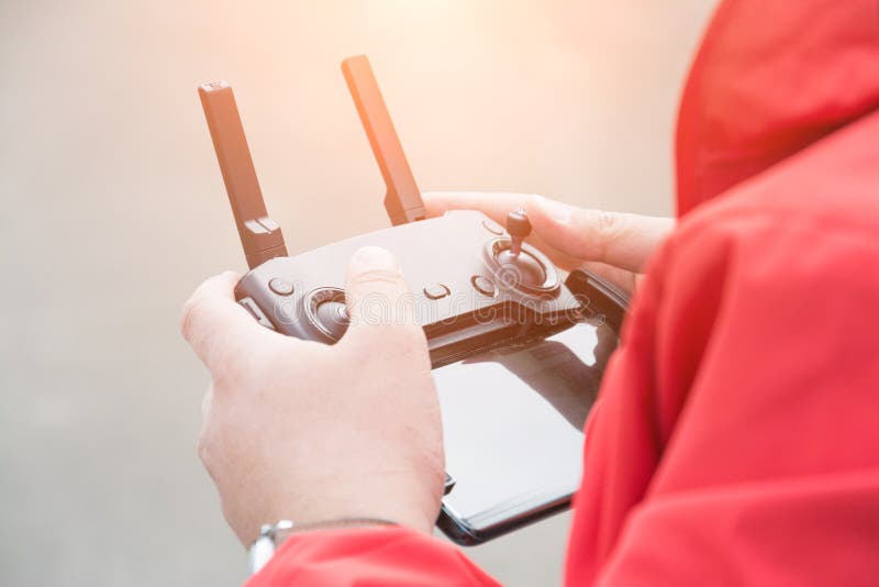 Man Holds a Drone Remote Controller in His Hands Stock Photo - Image of ...