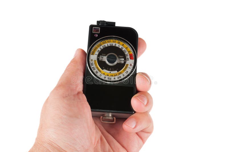 Man holds exposure meter stock photo. Image of electronics - 27617330