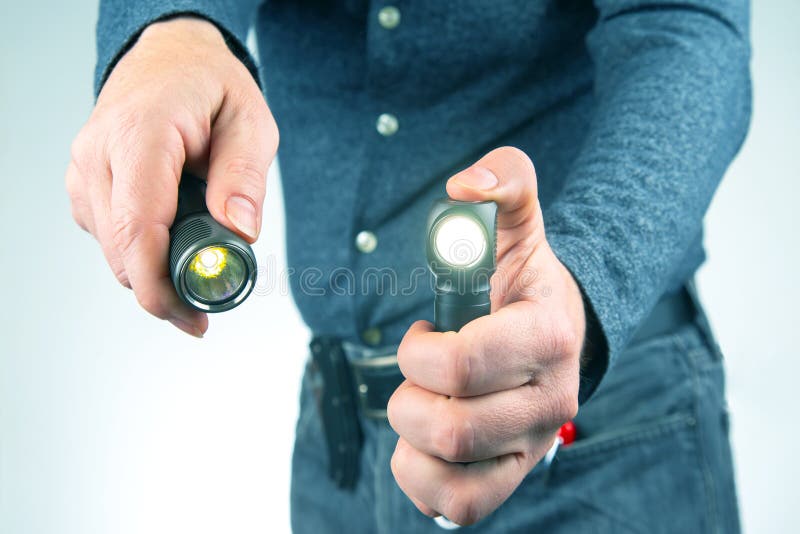 Man Holds a Flashlight in His Hand. Item for Camping and Household Life ...