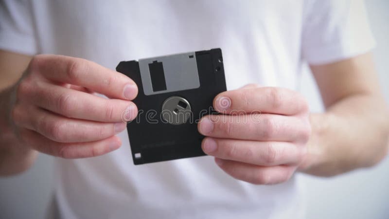 Man Holds Floppy Disk in Hands Stock Video - Video of bits, retro ...