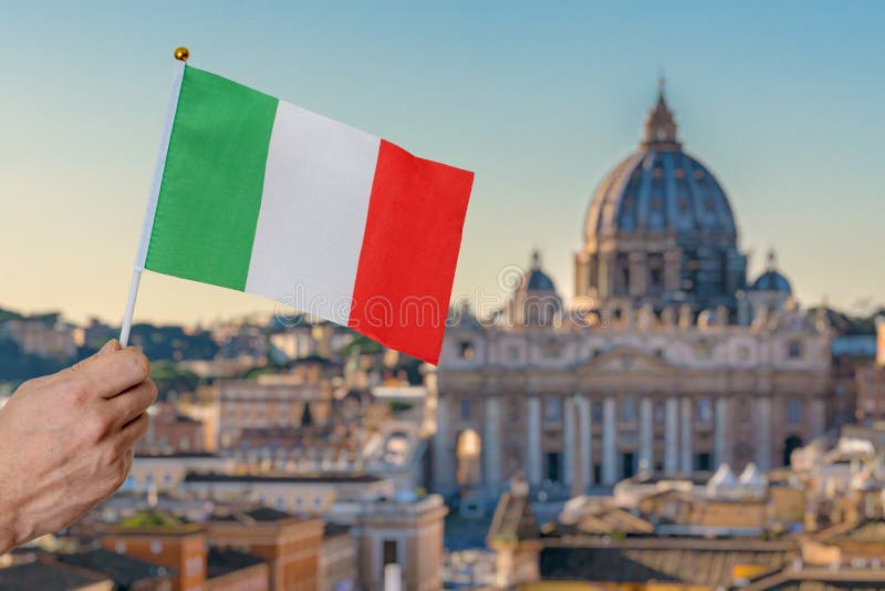 Man Holds Italian Flag in Hand. Saint Peter Basilica in Background ...