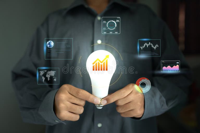 A Man Holds a Light Bulb with a Graph on it. the Graph Shows a Positive ...