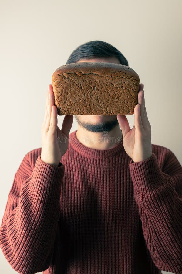 A Man Holds a Loaf of Homemade Rye Bread. Stock Image - Image of hold ...