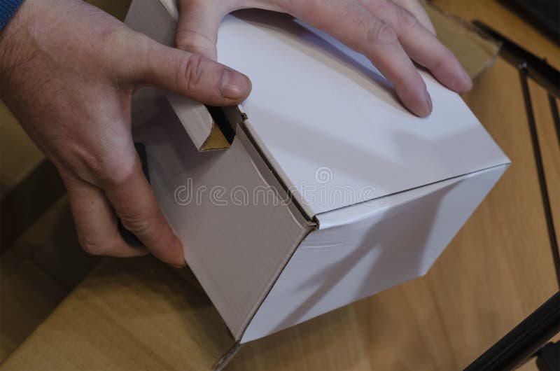 Man Holds Parcel in White Rectangular Cardboard Box Stock Photo - Image ...