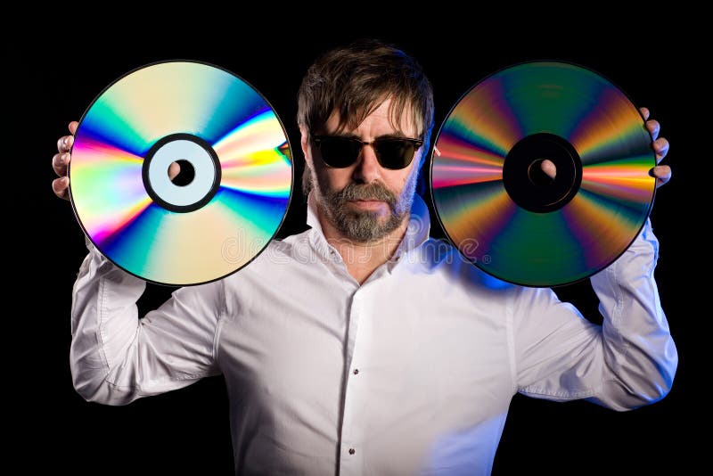 Man with the Retro Laser Disc Stock Photo - Image of reflection, people ...