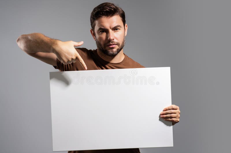 Man Holds Sign With Copy Space Placard Ready For Copy Space Product