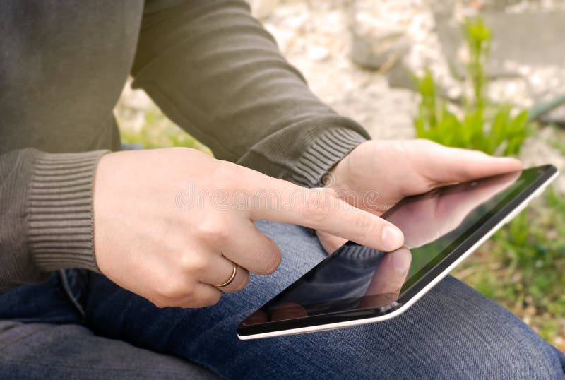 Man holds the tablet stock image. Image of close, holds - 53279123
