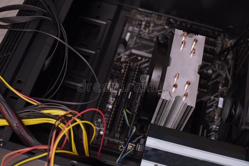 A Man at Home Collects, Disassembles a Computer. Hands of a Man Hold ...