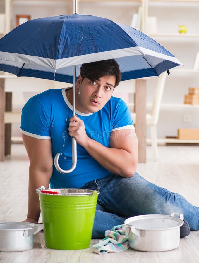 Man at Home Dealing with Neighbor Flood Leak Stock Photo - Image of ...
