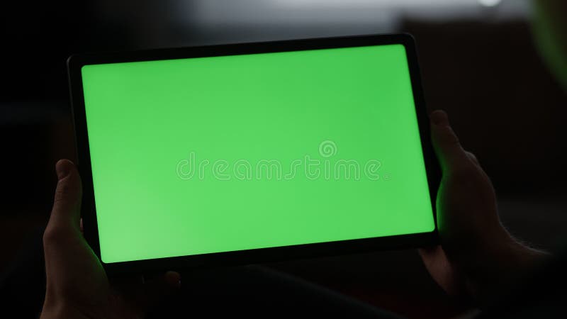 Man at Home Lying on a Couch with Tablet Pc with Green Screen Stock ...