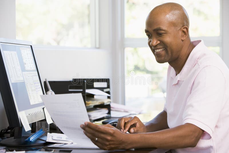 Man in Home Office Using Computer and Smiling Stock Image - Image of ...