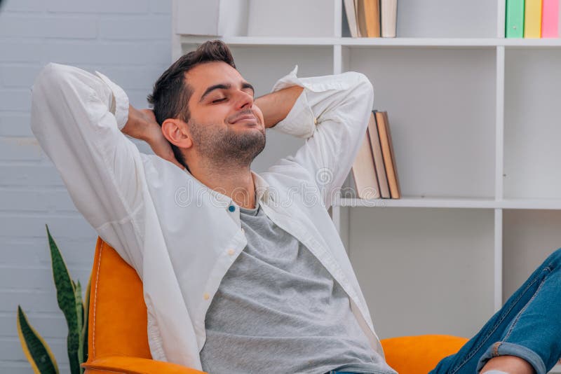 Man at home resting stock photo. Image of lifestyle - 239550138