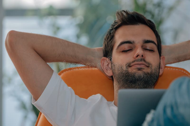 Man at Home Sleeping Relaxed with Computer Stock Photo - Image of sofa ...