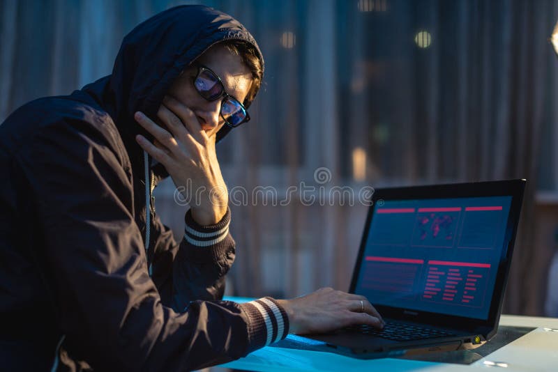 Man In The Hood Looking In The Camera Hacker Attacks And Stealing Access Databases With 5792