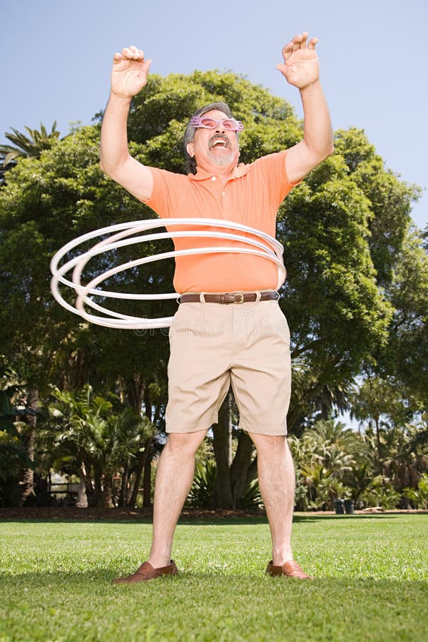 Man with hoops stock photo. Image of active, hoops, mature - 62533840