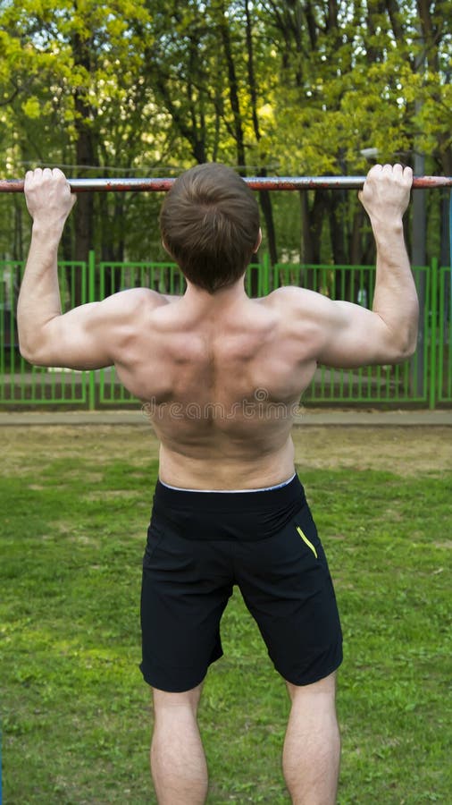 Man and horizontal bar stock image. Image of energy, muscularity - 55248337