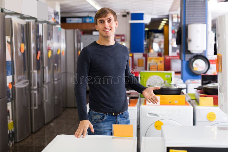 Man at Household Appliances Store Stock Photo - Image of happy, people ...