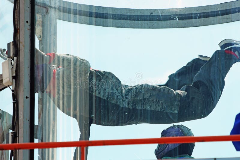 Man Hovering in an Air Pipe Stock Image - Image of helmet, jump: 140336707