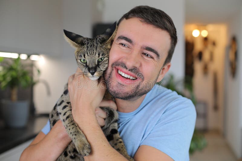 Man Hugging His Gorgeous Cat Stock Image - Image of kitty, african ...