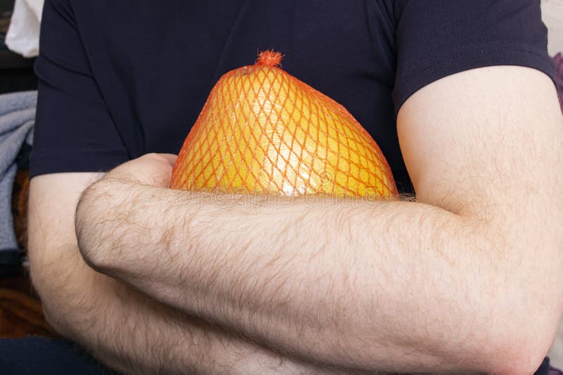 Man Hugs a Pomelo with Two Hands Stock Image - Image of yellow ...