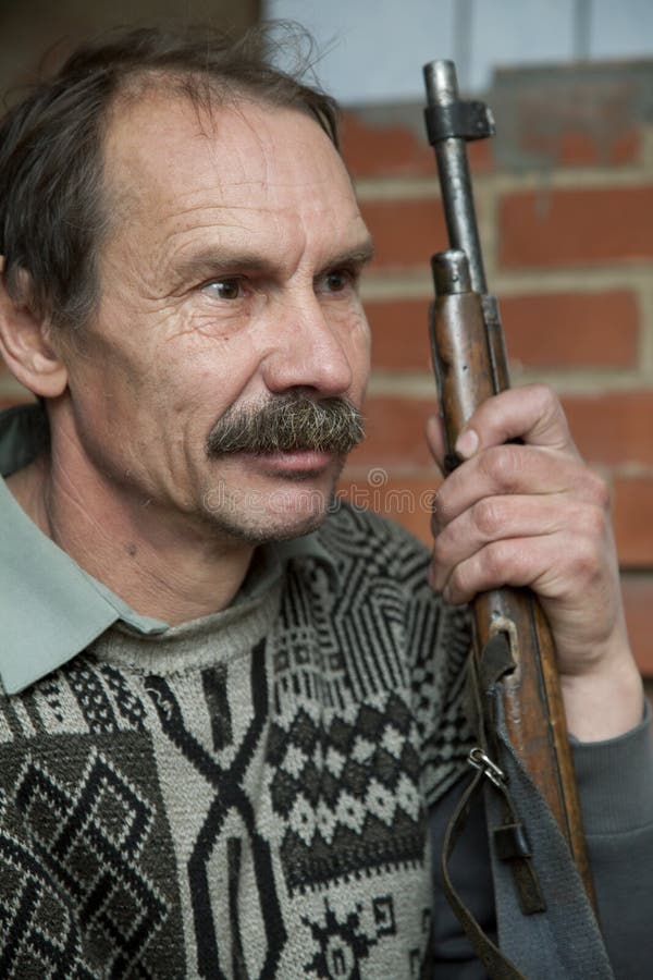 Man the Hunter with a Rifle Stock Photo - Image of male, people: 17778274